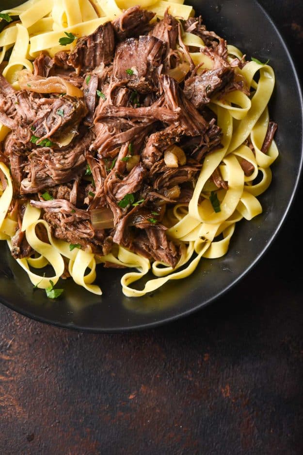 The Best Slow Cooker Shredded Beef Recipe - NeighborFood