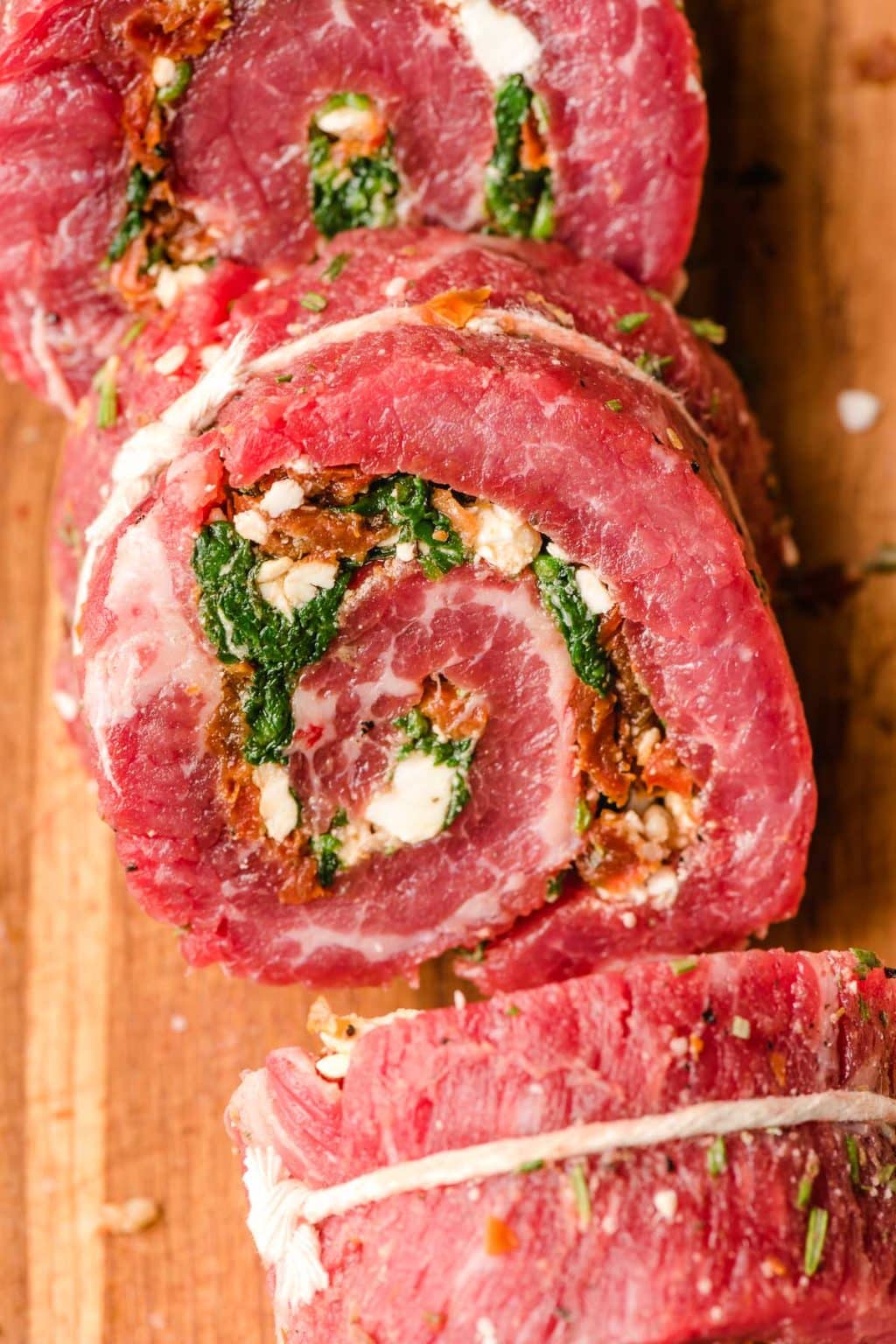 Beef Pinwheels with Sun Dried Tomatoes and Feta - NeighborFood