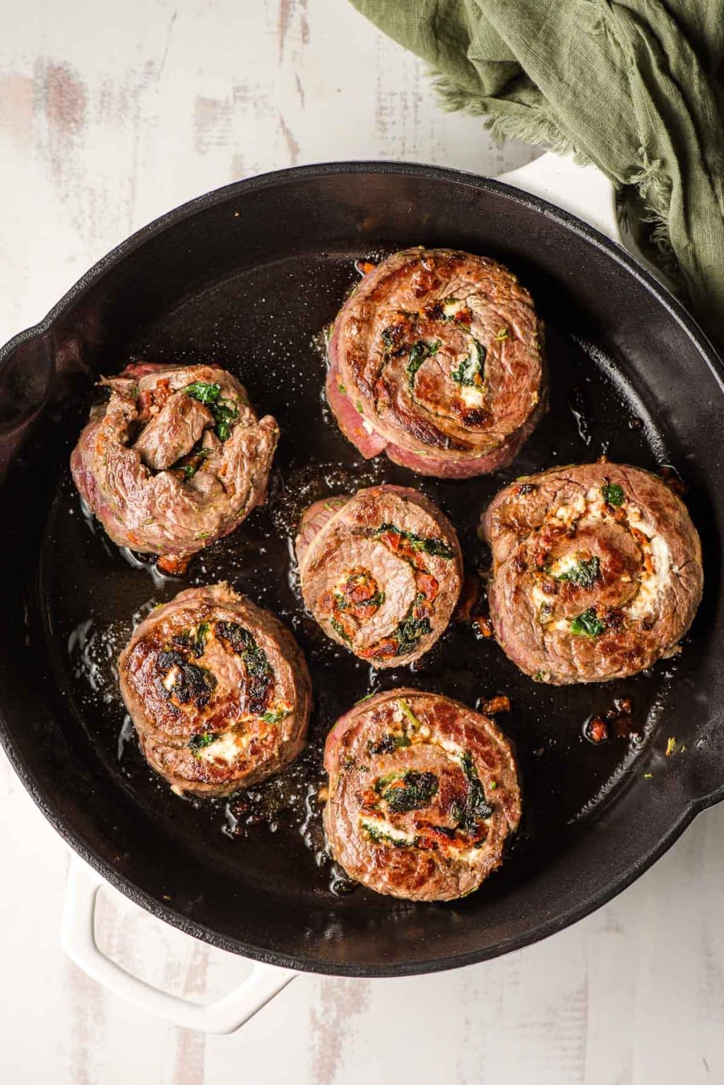 Beef Pinwheels with Sun Dried Tomatoes and Feta - NeighborFood